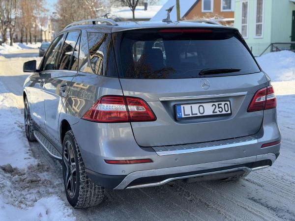 Grey Mercedes-Benz ML 250 2012 in Kaunas, with an engine capacity of 2.14 L and mileage of 280 thousand km for 11800 €, photo 6 on AUTOMOTO.COM.LV