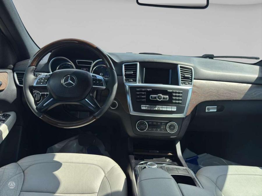 Grey Mercedes-Benz ML 250 2015 in Kaunas, with an engine capacity of 2.10 L and mileage of 312 thousand km for 13400 €, photo 14 on AUTOMOTO.COM.LV