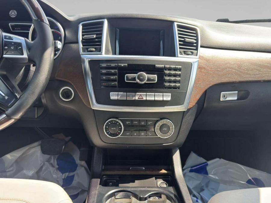 Grey Mercedes-Benz ML 250 2015 in Kaunas, with an engine capacity of 2.10 L and mileage of 312 thousand km for 13400 €, photo 15 on AUTOMOTO.COM.LV