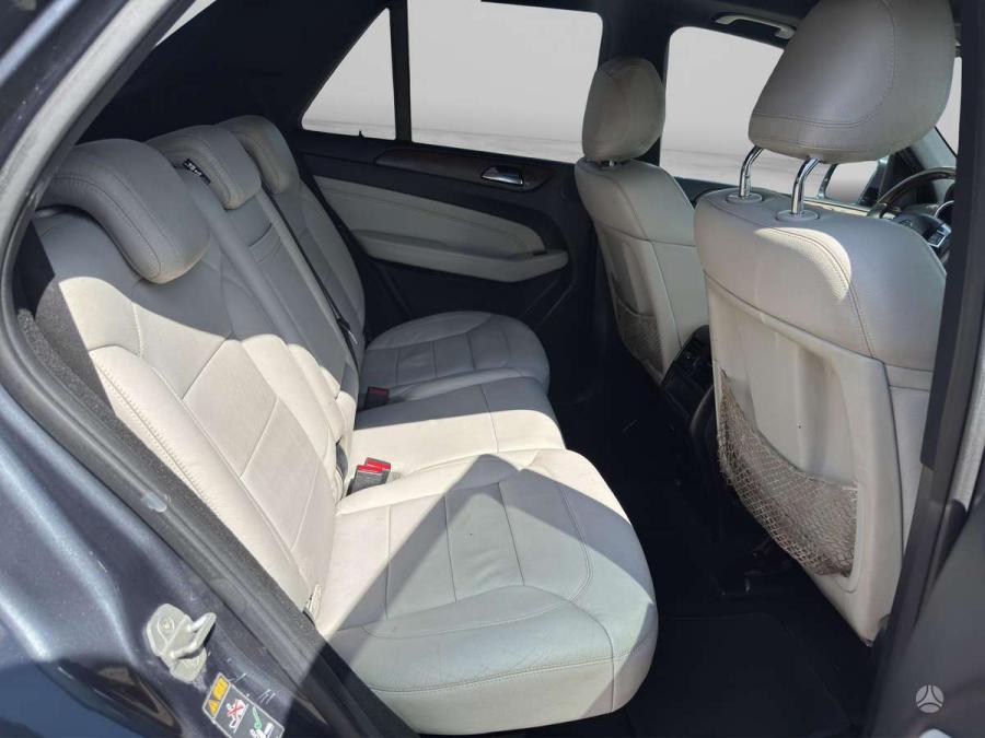 Grey Mercedes-Benz ML 250 2015 in Kaunas, with an engine capacity of 2.10 L and mileage of 312 thousand km for 13400 €, photo 19 on AUTOMOTO.COM.LV