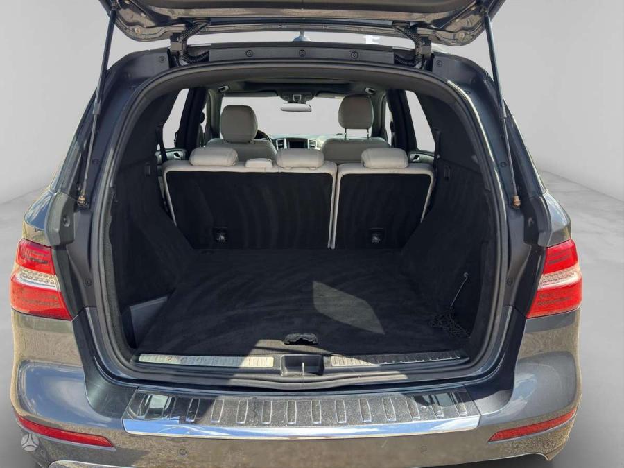 Grey Mercedes-Benz ML 250 2015 in Kaunas, with an engine capacity of 2.10 L and mileage of 312 thousand km for 13400 €, photo 20 on AUTOMOTO.COM.LV