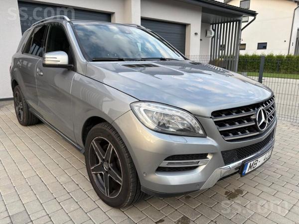 Grey Mercedes-Benz ML 250 2014 in Riga, with an engine capacity of 2.20 L and mileage of 280 thousand km for 13999 €, photo 4 on AUTOMOTO.COM.LV