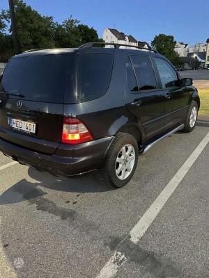 Melns Mercedes-Benz ML 270 2001 Kauņa, ar dzinēja tilpumu 2.69 L un nobraukumu 296 tūkst. km par 3800 €, foto 19 vietnē AUTOMOTO.COM.LV