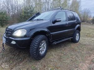 Black Mercedes-Benz ML 270 2002 in Vilnius, with an engine capacity of 2.70 L and mileage of 250 thousand km for 3700 €, photo 3 on AUTOMOTO.COM.LV
