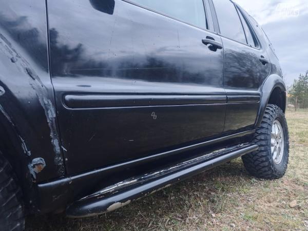 Melns Mercedes-Benz ML 270 2002 Viļņa, ar dzinēja tilpumu 2.70 L un nobraukumu 250 tūkst. km par 3700 €, foto 8 vietnē AUTOMOTO.COM.LV