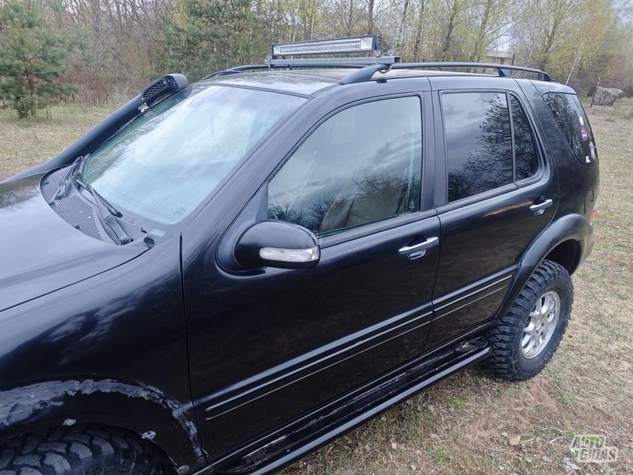 Black Mercedes-Benz ML 270 2002 in Vilnius, with an engine capacity of 2.70 L and mileage of 250 thousand km for 3700 €, photo 11 on AUTOMOTO.COM.LV