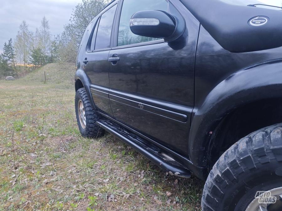 Black Mercedes-Benz ML 270 2002 in Vilnius, with an engine capacity of 2.70 L and mileage of 250 thousand km for 3700 €, photo 12 on AUTOMOTO.COM.LV