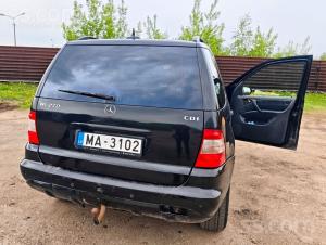 Black Mercedes-Benz ML 270 2004 in Daugavpils, with an engine capacity of 2.70 L and mileage of 277 thousand km for 3000 €, photo  on AUTOMOTO.COM.LV