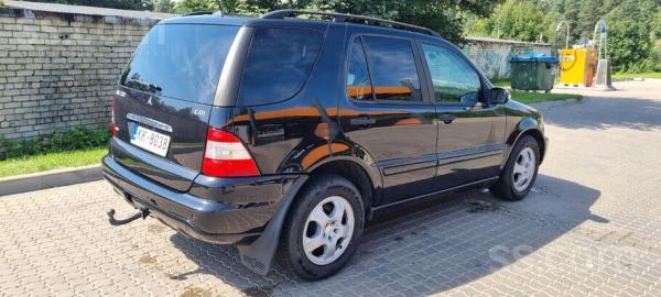 Black Mercedes-Benz ML 270 2004 in Riga, with an engine capacity of 2.70 L and mileage of 284 thousand km for 3200 €, photo 5 on AUTOMOTO.COM.LV