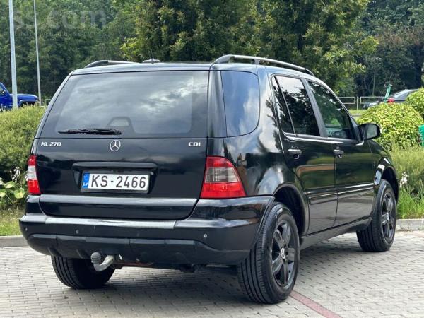 Black Mercedes-Benz ML 270 2005 in Riga, with an engine capacity of 2.70 L and mileage of 360 thousand km for 1850 €, photo 7 on AUTOMOTO.COM.LV
