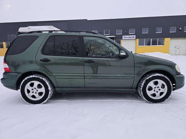 Green Mercedes-Benz ML 270 2003 in Utena, with an engine capacity of 2.70 L and mileage of 308 thousand km for 3999 €, photo 7 on AUTOMOTO.COM.LV