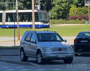 Grey Mercedes-Benz ML 270 2005 in Riga, with an engine capacity of 2.70 L and mileage of 330 thousand km for 3950 €, photo  on AUTOMOTO.COM.LV