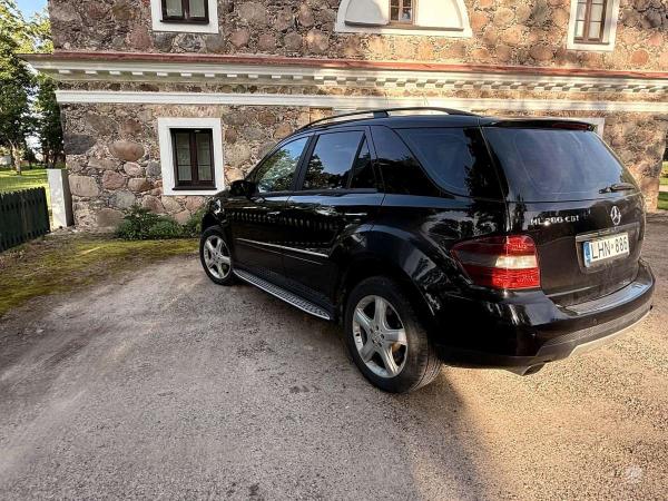Black Mercedes-Benz ML 280 2007 in Rokiskis, with an engine capacity of 2.99 L and mileage of 274 thousand km for 4600 €, photo 4 on AUTOMOTO.COM.LV