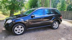 Black Mercedes-Benz ML 280 2010 in Pasvalys, with an engine capacity of 0.00 L and mileage of 256 thousand km for 5700 €, photo  on AUTOMOTO.COM.LV