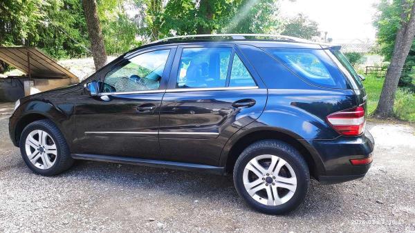 Black Mercedes-Benz ML 280 2010 in Pasvalys, with an engine capacity of 0.00 L and mileage of 256 thousand km for 5700 €, photo 2 on AUTOMOTO.COM.LV