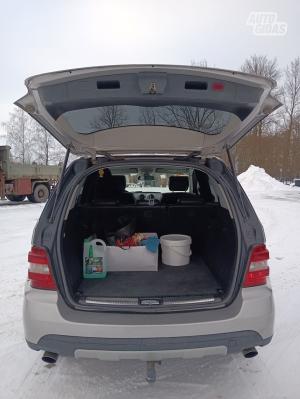 Grey Mercedes-Benz ML 280 2006 in Raseiniai, with an engine capacity of 3.00 L and mileage of 320 thousand km for 7450 €, photo 26 on AUTOMOTO.COM.LV