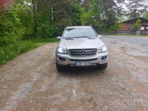 Sarkans Mercedes-Benz ML 280 2007 Rīga, ar dzinēja tilpumu 3.00 L un nobraukumu 462 tūkst. km par 3700 €, foto  vietnē AUTOMOTO.COM.LV