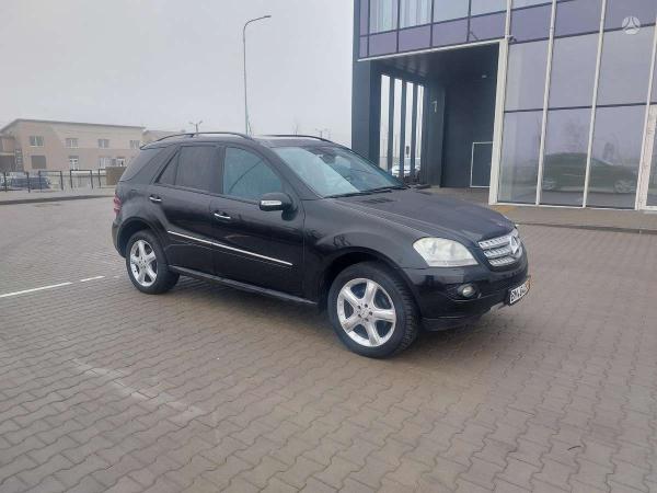 Black Mercedes-Benz ML 300 2008 in Vilnius, with an engine capacity of 2.80 L and mileage of 212 thousand km for 6250 €, photo 1 on AUTOMOTO.COM.LV