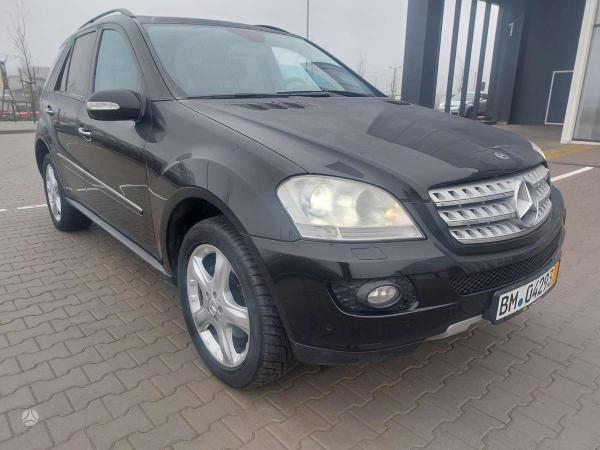 Black Mercedes-Benz ML 300 2008 in Vilnius, with an engine capacity of 2.80 L and mileage of 212 thousand km for 6250 €, photo 5 on AUTOMOTO.COM.LV