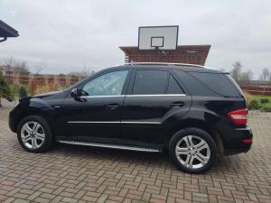 Black Mercedes-Benz ML 300 2009 in Pakruojis, with an engine capacity of 2.99 L and mileage of 267 thousand km for 7250 €, photo 7 on AUTOMOTO.COM.LV