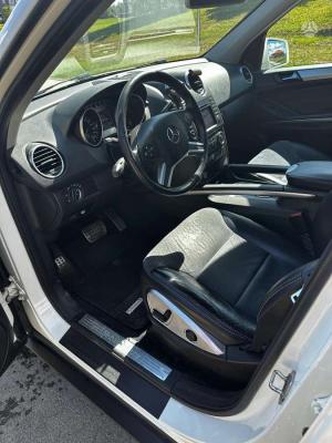 White Mercedes-Benz ML 300 2011 in Jonava, with an engine capacity of 3.00 L and mileage of 262 thousand km for 8000 €, photo 6 on AUTOMOTO.COM.LV