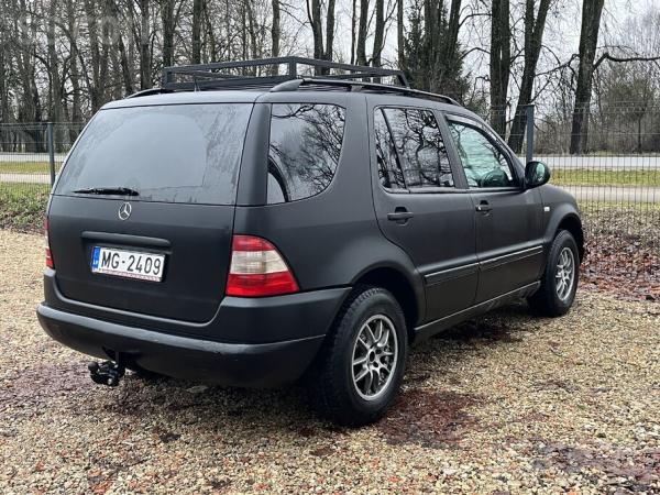 Melns Mercedes-Benz ML 320 1999 Cēsis, ar dzinēja tilpumu 3.20 L un nobraukumu 0 tūkst. km par 2900 €, foto 8 vietnē AUTOMOTO.COM.LV