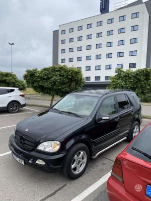 Black Mercedes-Benz ML 320 2002 in Vilnius, with an engine capacity of 3.20 L and mileage of 290 thousand km for 1450 €, photo 5 on AUTOMOTO.COM.LV