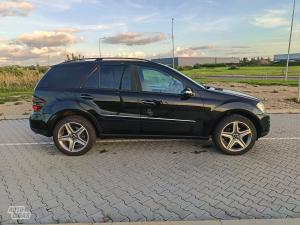 Black Mercedes-Benz ML 320 2005 in Panevezys, with an engine capacity of 3.20 L and mileage of 274 thousand km for 4500 €, photo 5 on AUTOMOTO.COM.LV