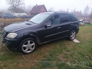 Black Mercedes-Benz ML 320 2006 in Ogre, with an engine capacity of 3.00 L and mileage of 260 thousand km for 5200 €, photo  on AUTOMOTO.COM.LV
