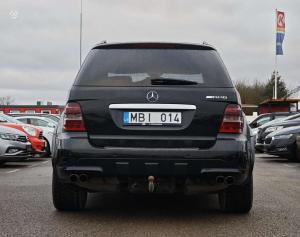 Black Mercedes-Benz ML 320 2006 in Vilnius, with an engine capacity of 2.99 L and mileage of 366 thousand km for 7700 €, photo 6 on AUTOMOTO.COM.LV