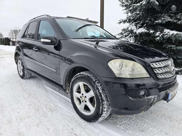 Black Mercedes-Benz ML 320 2006 in Kaunas, with an engine capacity of 3.00 L and mileage of 264 thousand km for 4800 €, photo 1 on AUTOMOTO.COM.LV