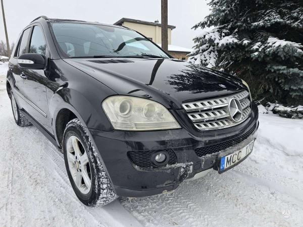 Black Mercedes-Benz ML 320 2006 in Kaunas, with an engine capacity of 3.00 L and mileage of 264 thousand km for 4800 €, photo 2 on AUTOMOTO.COM.LV