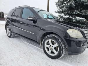 Black Mercedes-Benz ML 320 2006 in Kaunas, with an engine capacity of 3.00 L and mileage of 264 thousand km for 4800 €, photo 3 on AUTOMOTO.COM.LV