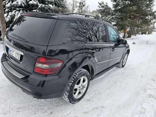 Black Mercedes-Benz ML 320 2006 in Kaunas, with an engine capacity of 3.00 L and mileage of 264 thousand km for 4800 €, photo 7 on AUTOMOTO.COM.LV