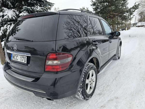 Black Mercedes-Benz ML 320 2006 in Kaunas, with an engine capacity of 3.00 L and mileage of 264 thousand km for 4800 €, photo 8 on AUTOMOTO.COM.LV