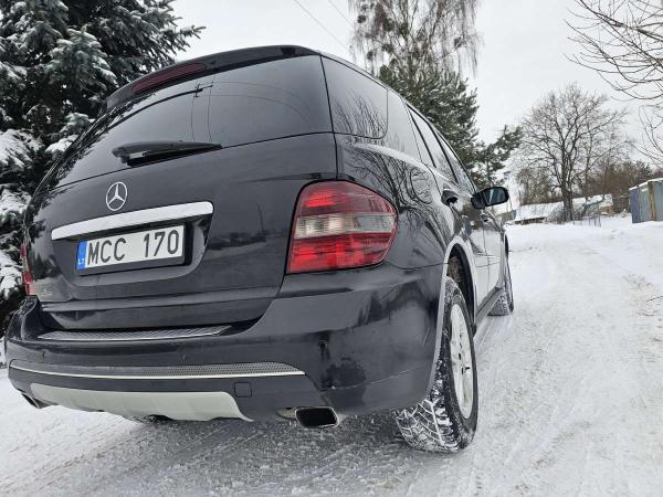 Black Mercedes-Benz ML 320 2006 in Kaunas, with an engine capacity of 3.00 L and mileage of 264 thousand km for 4800 €, photo 9 on AUTOMOTO.COM.LV