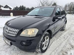 Black Mercedes-Benz ML 320 2006 in Kaunas, with an engine capacity of 3.00 L and mileage of 264 thousand km for 4800 €, photo 11 on AUTOMOTO.COM.LV