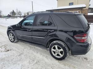 Black Mercedes-Benz ML 320 2006 in Kaunas, with an engine capacity of 3.00 L and mileage of 264 thousand km for 4800 €, photo 16 on AUTOMOTO.COM.LV
