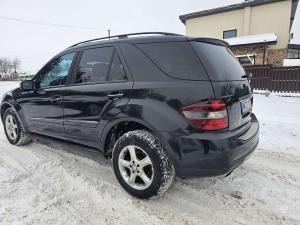 Black Mercedes-Benz ML 320 2006 in Kaunas, with an engine capacity of 3.00 L and mileage of 264 thousand km for 4800 €, photo 17 on AUTOMOTO.COM.LV