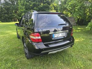 Black Mercedes-Benz ML 320 2006 in Jurbarkas, with an engine capacity of 3.00 L and mileage of 290 thousand km for 4300 €, photo 6 on AUTOMOTO.COM.LV