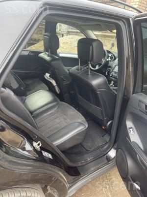 Black Mercedes-Benz ML 320 2006 in Rezekne, with an engine capacity of 3.00 L and mileage of 325 thousand km for 4800 €, photo 11 on AUTOMOTO.COM.LV