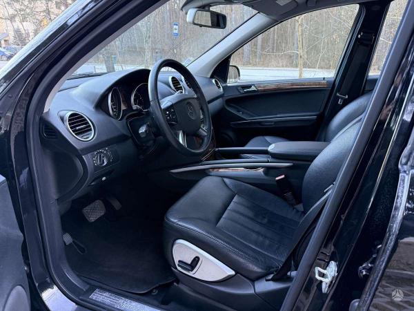 Black Mercedes-Benz ML 320 2007 in Vilnius, with an engine capacity of 2.99 L and mileage of 165 thousand km for 8799 €, photo 11 on AUTOMOTO.COM.LV
