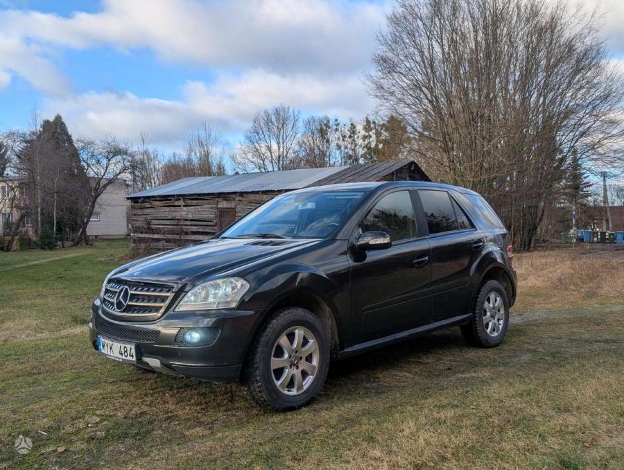 Black Mercedes-Benz ML 320 2007 in Kaunas, with an engine capacity of 2.99 L and mileage of 380 thousand km for 5900 €, photo 1 on AUTOMOTO.COM.LV