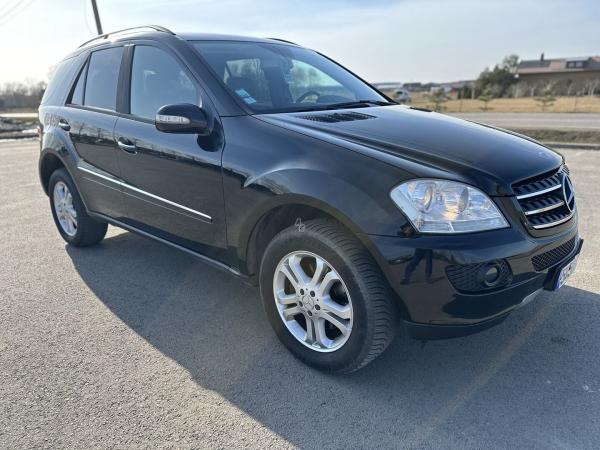 Black Mercedes-Benz ML 320 2007 in Kaunas, with an engine capacity of 3.00 L and mileage of 186 thousand km for 7222 €, photo 1 on AUTOMOTO.COM.LV
