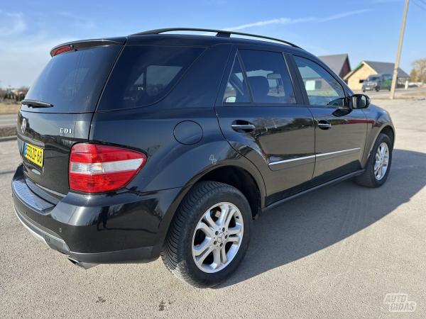 Black Mercedes-Benz ML 320 2007 in Kaunas, with an engine capacity of 3.00 L and mileage of 186 thousand km for 7222 €, photo 6 on AUTOMOTO.COM.LV
