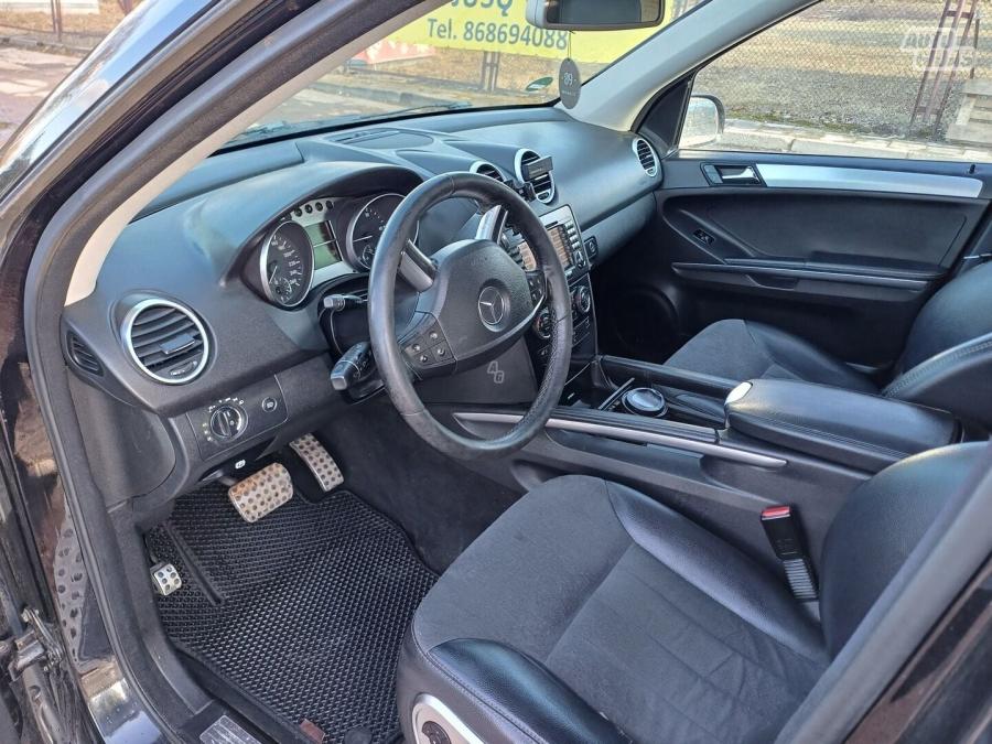 Black Mercedes-Benz ML 320 2007 in Sakiai, with an engine capacity of 3.00 L and mileage of 215 thousand km for 3500 €, photo 9 on AUTOMOTO.COM.LV