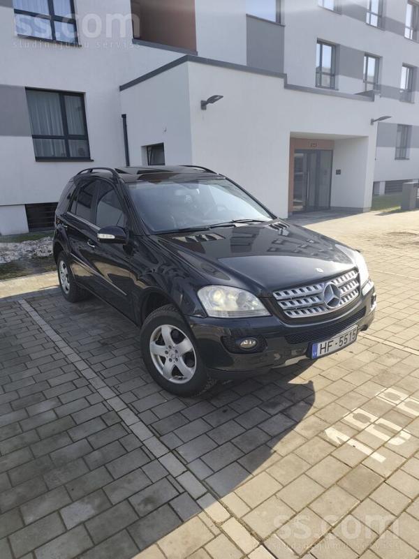 Black Mercedes-Benz ML 320 2007 in Riga, with an engine capacity of 3.00 L and mileage of 225 thousand km for 5990 €, photo 1 on AUTOMOTO.COM.LV