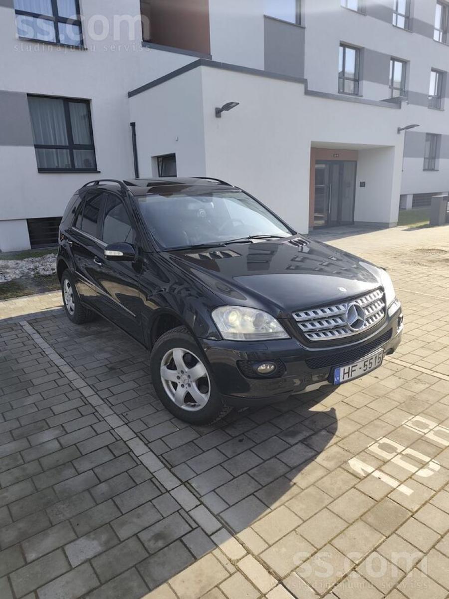 Black Mercedes-Benz ML 320 2007 in Riga, with an engine capacity of 3.00 L and mileage of 225 thousand km for 5990 €, photo 1 on AUTOMOTO.COM.LV