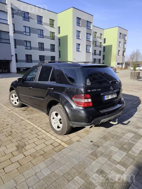Black Mercedes-Benz ML 320 2007 in Riga, with an engine capacity of 3.00 L and mileage of 225 thousand km for 5990 €, photo 7 on AUTOMOTO.COM.LV