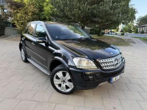 Black Mercedes-Benz ML 320 2007 in Vilnius, with an engine capacity of 2.99 L and mileage of 300 thousand km for 3999 €, photo 5 on AUTOMOTO.COM.LV